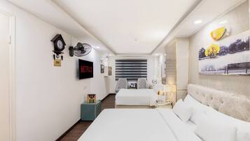 Quarto família | Frigobar, cofres nos quartos, ferros/tábuas de passar roupa