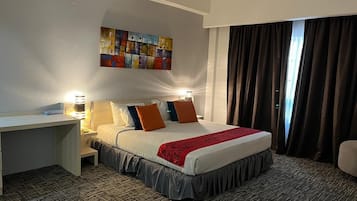 Quarto Duplo Standard (Queen) | Minibar, cofre no quarto, roupa de cama fornecida