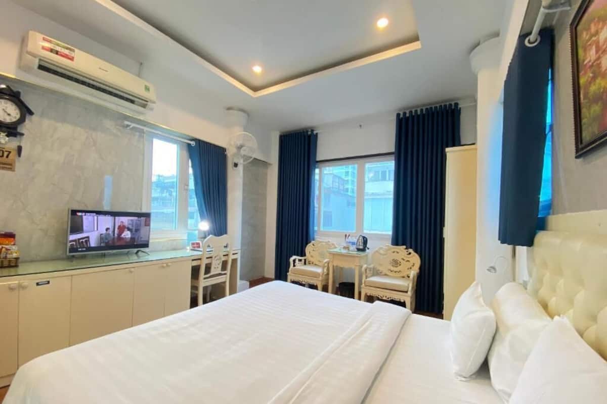 Quarto Duplo Superior | Minibar, cofre no quarto, ferro/tábua de engomar, Wi-fi grátis