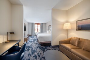 Suite, várias camas | Cortinas/cortinados opacos, ferro/tábua de engomar 