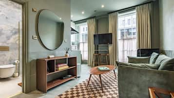 Apartamento Design, casa de banho anexa, Vista para a cidade | Sala de estar | Netflix, serviços de streaming