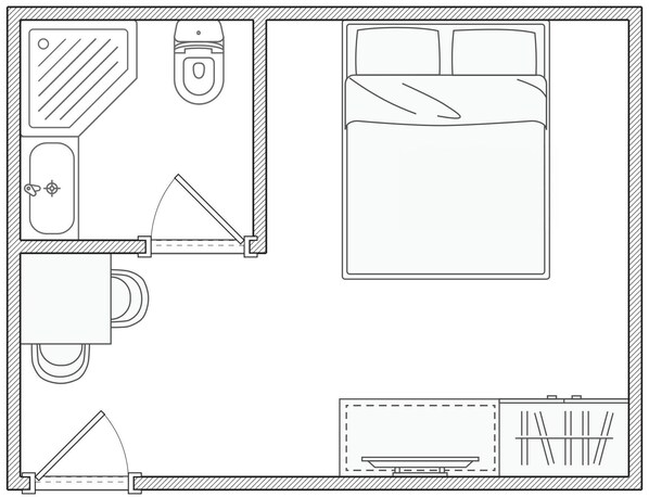 Quarto com cama, banheiro pequeno com vaso sanitário e pia, e cozinha compacta com fogão e micro-ondas.