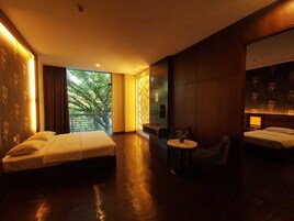 Suíte empresarial, vista para o jardim | Escrivaninha, Wi-Fi de cortesia, roupa de cama