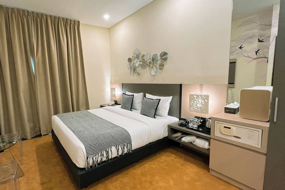Suite Room Nusa Paradise | Minibar grátis, cofre no quarto, secretária, ferro/tábua de engomar 