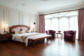 Quarto Individual Deluxe | Minibar, cofre no quarto, secretária, cortinas/cortinados opacos 