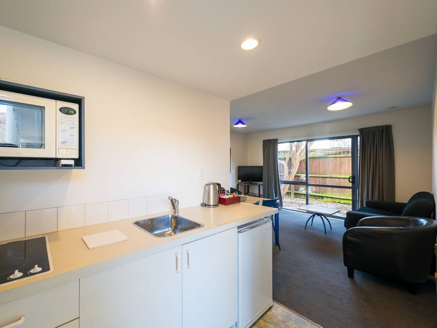 Apartamento, 2 quartos | Cozinha privada | Um frigorífico, um micro-ondas, uma placa de cozinha