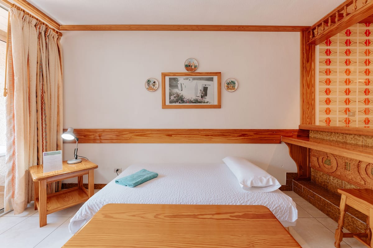 Quarto Triplo Standard | 1 quarto, cofre no quarto, roupa de cama fornecida 
