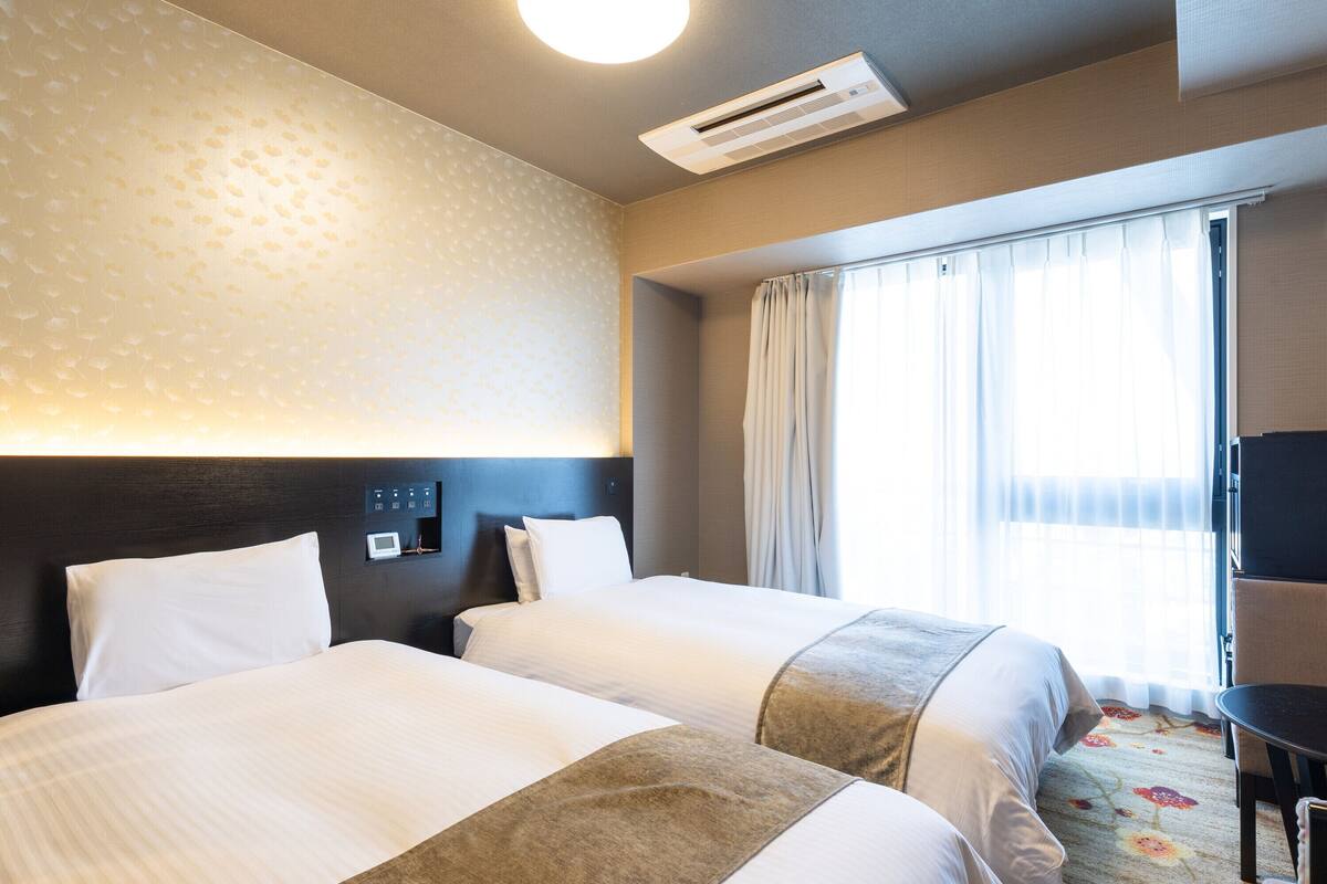 Quarto Twin Superior, não fumadores | Ferro/tábua de engomar, Wi-fi grátis, roupa de cama fornecida 
