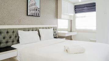 Quarto | Área de estar | TV