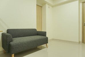 Quarto | Área de estar | TV