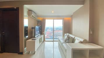 Quarto | Área de estar | TV