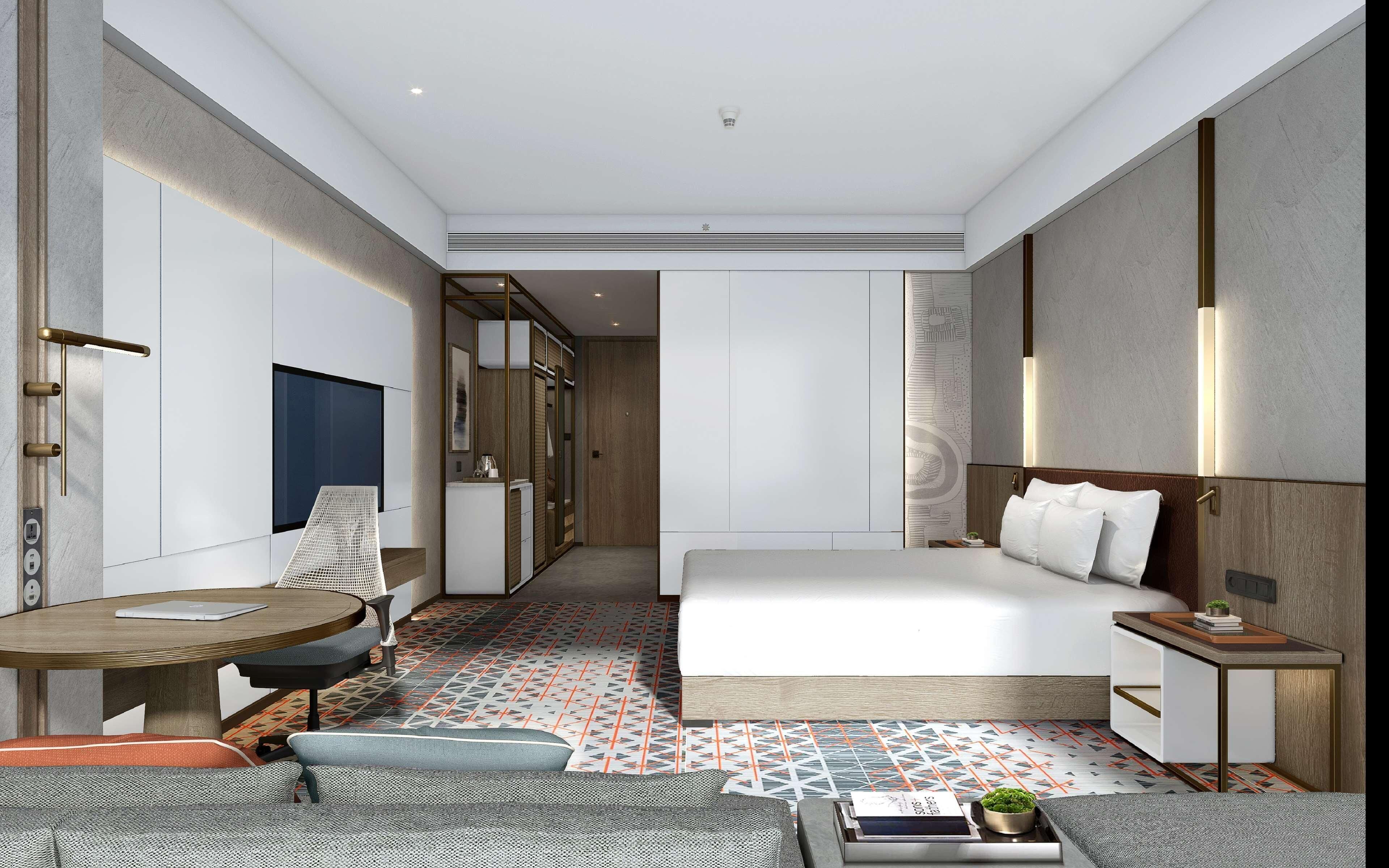 Roupas de cama premium, frigobar, cofres nos quartos