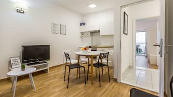 Apartamento | Cozinha privada | Geladeira, fogão, cooktop, chaleira elétrica