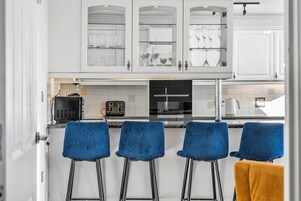 Penthouse Deluxe, casa de banho privativa, vista para o mar | Cozinha partilhada