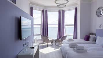 Quarto triplo superior, suíte, vista para o mar | 1 quarto