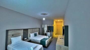 Quarto luxo | Escrivaninha, quartos à prova de som, Wi-Fi de cortesia, roupa de cama