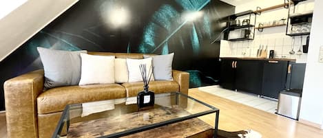 Suíte estúdio exclusiva | Área de estar | TV de tela plana 40 polegadas com canais a cabo, TV