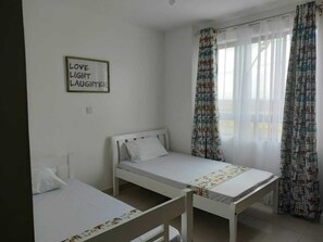 Apartamento | 2 quartos, ferros/tábuas de passar roupa, Wi-Fi de cortesia
