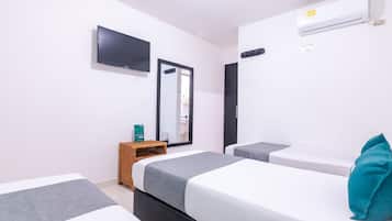 Quarto Triplo Standard | Minibar, Wi-fi grátis, roupa de cama fornecida