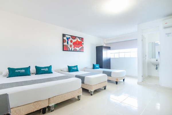 Habitacion Quintuple | Frigobar, Wi-Fi de cortesia, roupa de cama