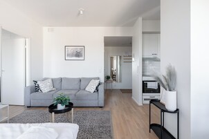 Apartamento exclusivo | Área de estar | TV de tela plana 40 polegadas com canais a cabo, TV