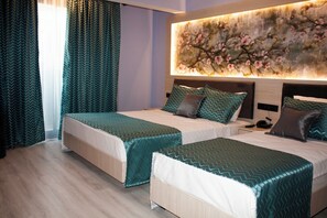 Quarto standard | Frigobar, cofres nos quartos, individualmente decorados