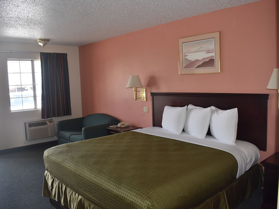 Quarto solteiro econômico, para não fumantes | Cortinas blackout, ferros/tábuas de passar roupa, Wi-Fi de cortesia