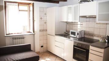 Apartamento Superior | Cozinha privada | Uma chaleira elétrica