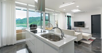 Cobertura (B) | Área de estar | TV de tela plana, pisos aquecidos