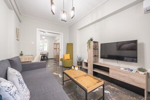 Apartamento Cidade | Sala de estar | TV de ecrã plano 