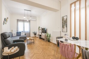 Apartamento Cidade | Sala de estar | TV de ecrã plano 