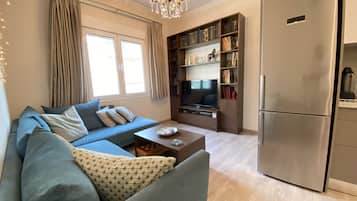 Apartamento Cidade | Sala de estar | Televisor LCD de 45 polegadas com canais digitais, televisor