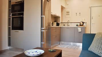 Apartamento Cidade | Sala de estar | Televisor LCD de 45 polegadas com canais digitais, televisor