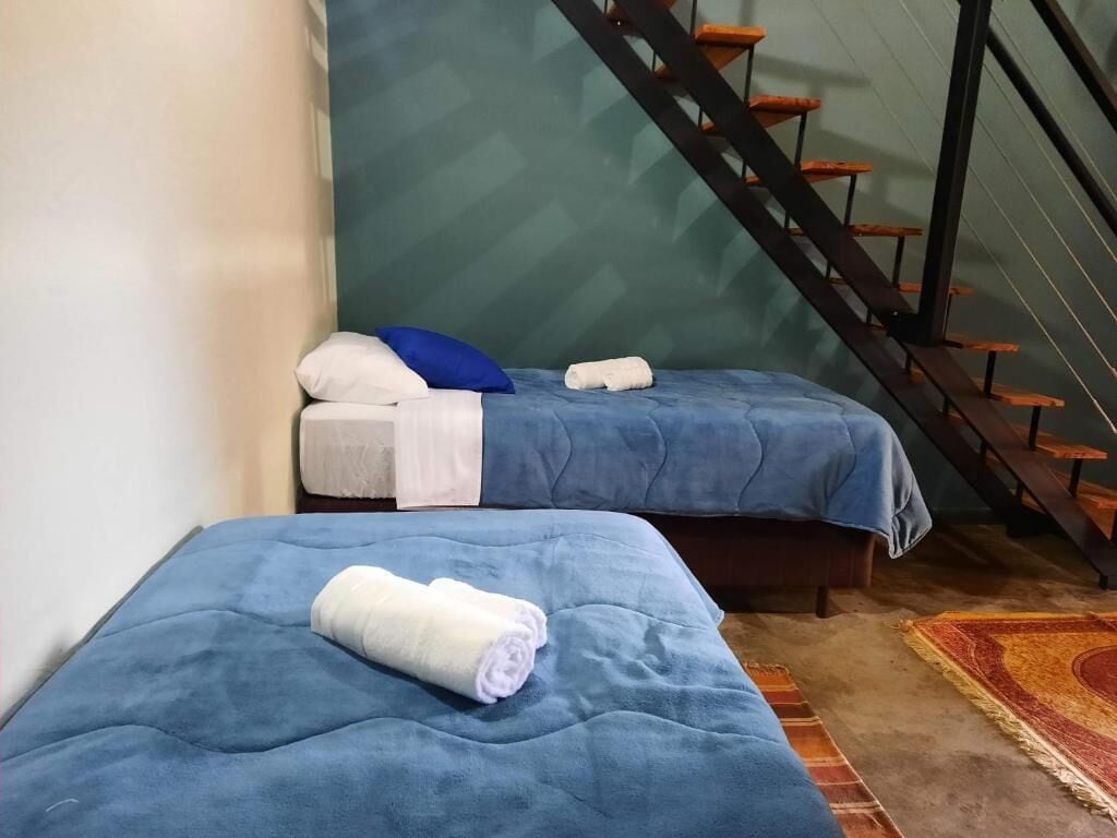 Quarto família | Frigobar, cortinas blackout, Wi-Fi de cortesia, roupa de cama