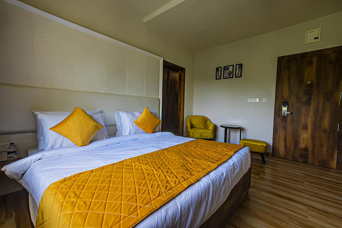Quarto Duplo Deluxe | Roupa de alta qualidade, minibar, cofre com capacidade para portátil 
