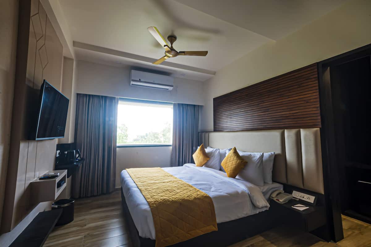 Quarto Duplo Executivo | Roupa de alta qualidade, minibar, cofre com capacidade para portátil 