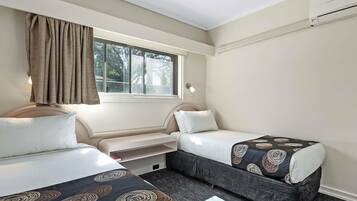 Apartamento, 2 quartos | Ferros/tábuas de passar roupa, Wi-Fi de cortesia, roupa de cama