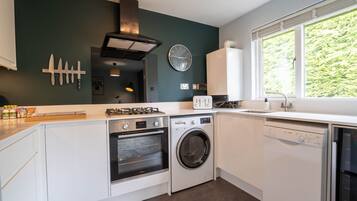 Apartamento luxo, suíte, vista para o jardim (2 bed 1 bath apartment) | Cozinha compartilhada