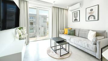 Apartamento (31/14A) | Área de estar | TV de tela plana