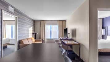 Suite, 2 quartos | Wi-fi grátis, roupa de cama fornecida