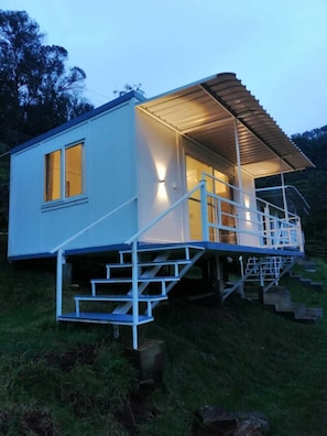 Quarto luxo | Vista para o jardim