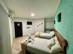 Suite-Estúdio Deluxe, várias camas | Com decoração personalizada, com mobília individualizada, Wi-fi grátis 