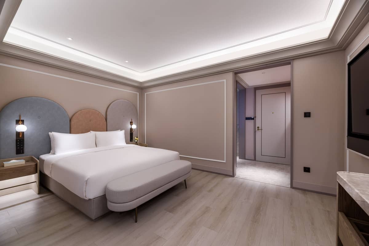 Quarto Deluxe, 1 cama king-size | Sala de estar