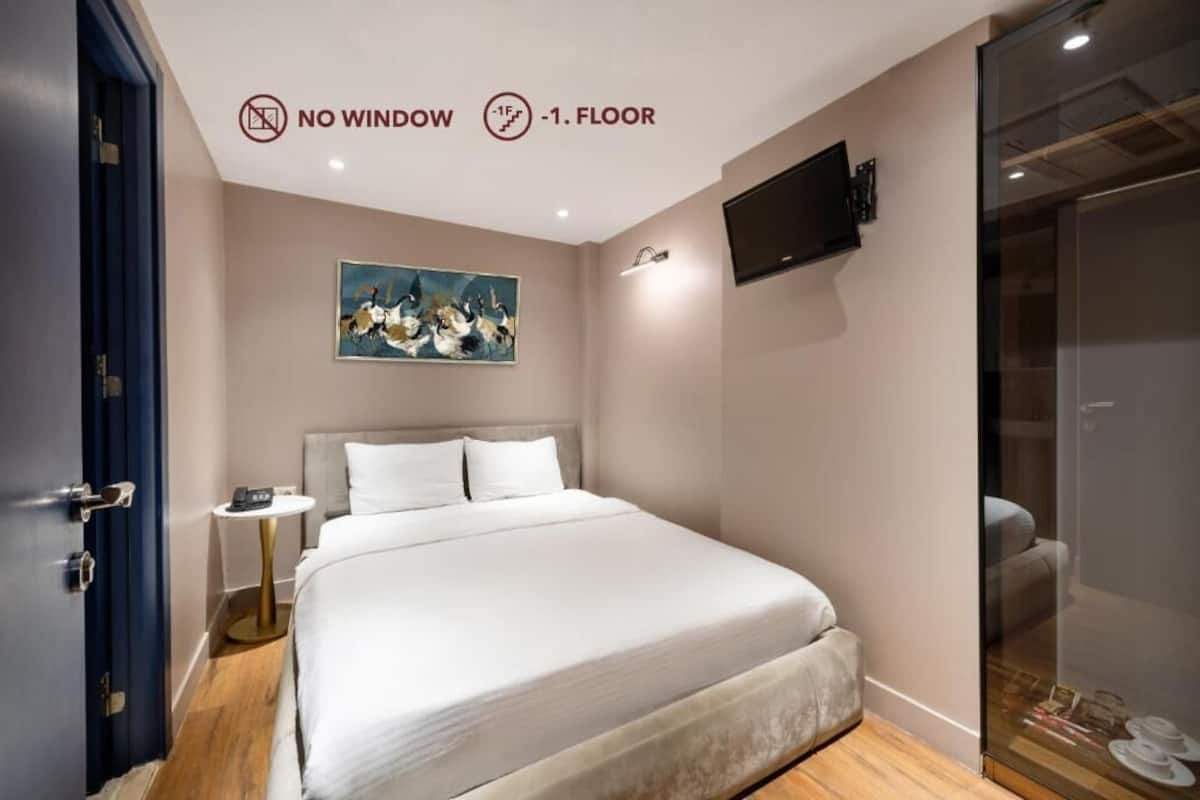 Economy Room, No Windows -1 Floor | 2 quartos, roupas de cama premium, frigobar, cofres nos quartos