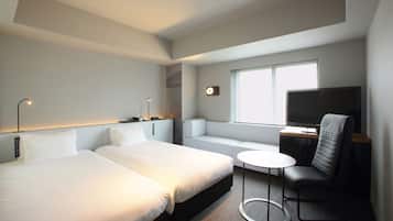 Quarto Twin, não fumadores (C, 25 square meter(110x200 2 beds)) | Cofre no quarto, secretária, cortinas/cortinados opacos