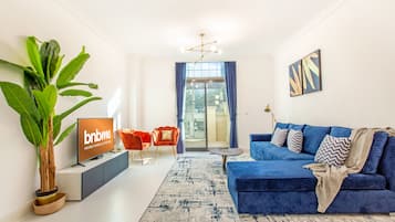 Apartamento Deluxe | Sala de estar | Televisor LED