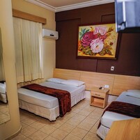 Quarto luxo | Frigobar, Wi-Fi de cortesia, roupa de cama