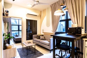 Apartamento | Área de estar | Smart TV 40 polegadas com canais a cabo, TV