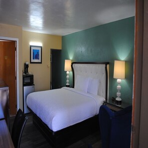 Quarto Individual Standard, 1 cama king-size | Ferro/tábua de engomar, Wi-fi grátis, roupa de cama fornecida 