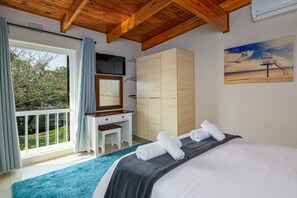 Vila superior | 3 quartos, roupa de cama